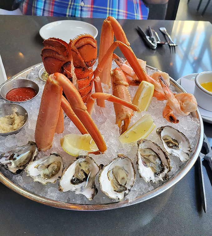 The seafood tower&mdash;where crab legs reach skyward like they're trying to return to the ocean. It's the aquatic equivalent of a Vegas showstopper.