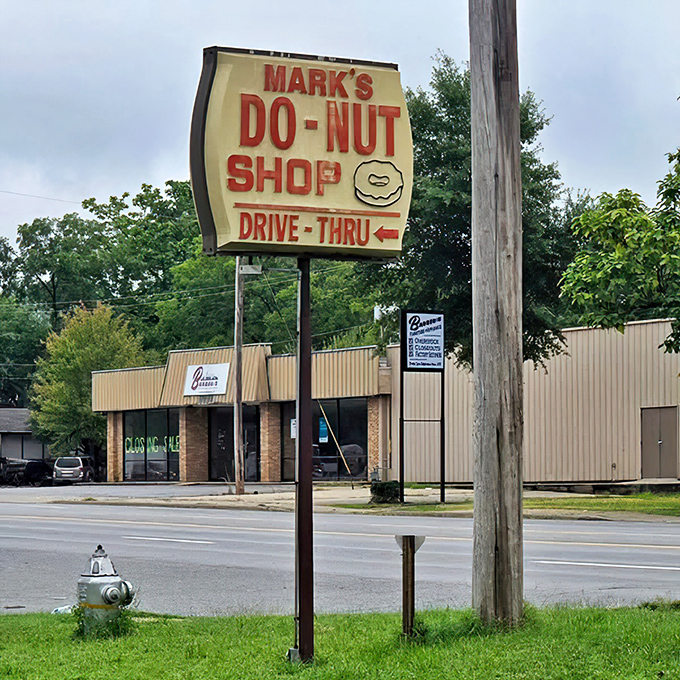 The beacon of breakfast hope. This vintage sign has guided hungry travelers to donut salvation for decades.