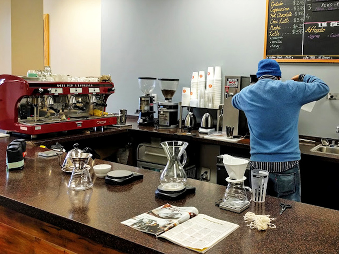 Behind the scenes where coffee magic happens. The barista's workspace resembles a scientist's lab&mdash;precision tools for perfect extraction.