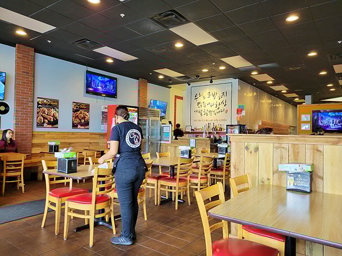 Where the magic happens &ndash; staff attending to tables in a dining room where chicken dreams come true. Like watching craftspeople in their element.