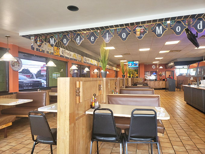 The warm, inviting interior where Corona signs meet traditional decor. This isn't just a restaurant&mdash;it's a cultural crossroads where Tex meets Mex.