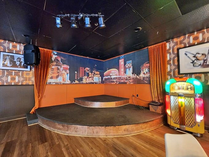 The stage where rockabilly dreams come true, complete with vintage Vegas backdrop and a jukebox that's seen more hits than Billboard.