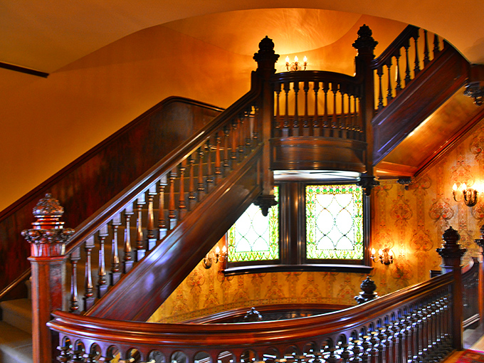 This staircase wasn't just built&mdash;it was composed, like a symphony in wood. The warm glow of the wall sconces creates an ambiance that no Instagram filter could improve.