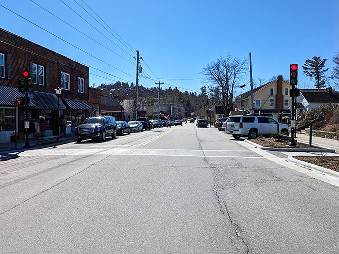 Small-town Main Street, where traffic lights are suggestions and nobody's really in a hurry. The pace here is set by conversation, not commutes.