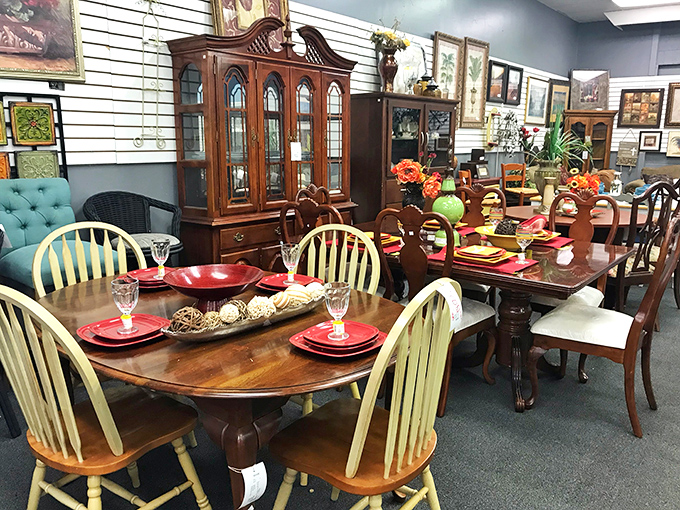 Dining table vignettes staged with such care you half-expect a family to materialize for Sunday dinner. Yellow Windsor chairs paired with rich mahogany&mdash;a match made in furniture heaven.