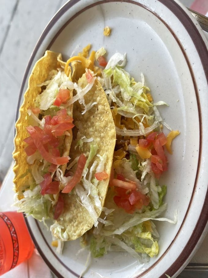 Crispy tacos that crunch with authority, filled with the kind of fresh ingredients that make you momentarily forget your troubles.