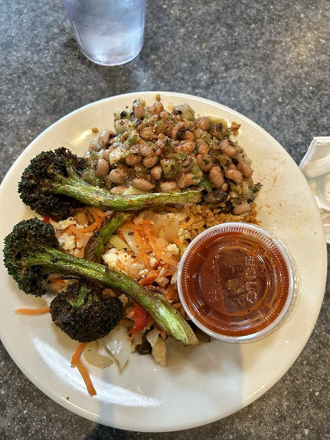 A plate that proves Big's isn't just about chicken&mdash;roasted vegetables and seasoned beans show the same attention to detail as their signature bird.