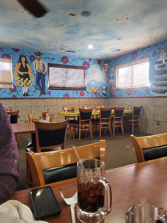 Wall-to-wall wonder where every painted flower and bird seems to dance along with the conversation and laughter filling the dining room.