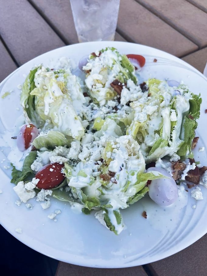 A wedge salad that makes eating vegetables feel like cheating. When blue cheese and bacon are involved, lettuce suddenly becomes interesting.
