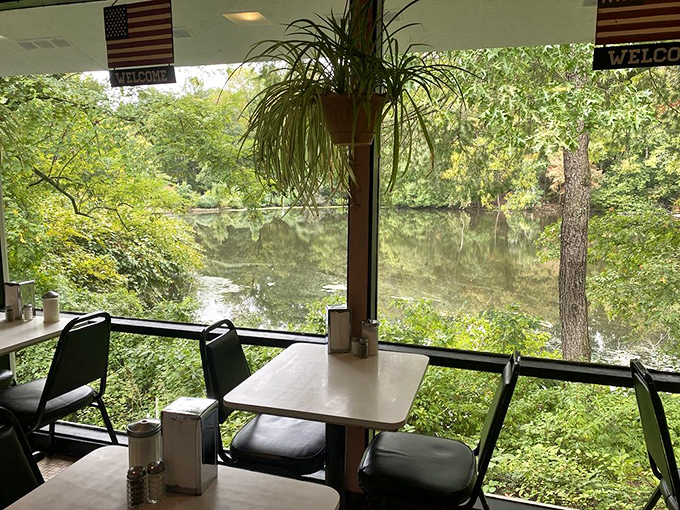 A table with a view that makes coffee taste better. Nature's morning show unfolds beyond the glass while breakfast works its magic within.