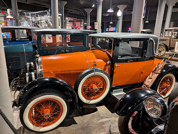 The two-tone 1925 Kissel 6-55 Enclosed Speedster sports Halloween-worthy orange and black. Proof that bold color choices aren't just a modern automotive trend