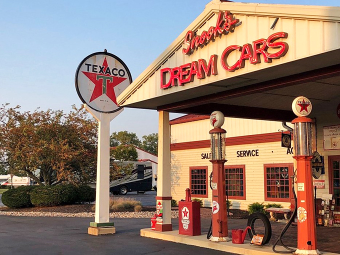 As evening approaches, the Texaco station glows with vintage charm, a beacon for car lovers and nostalgia seekers alike.