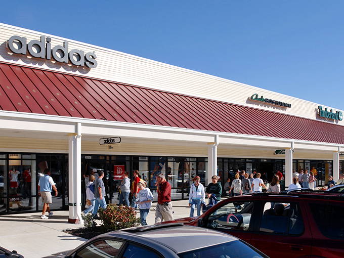 Adidas draws a crowd that would make any nightclub jealous. The universal language of discounted sportswear brings people together.