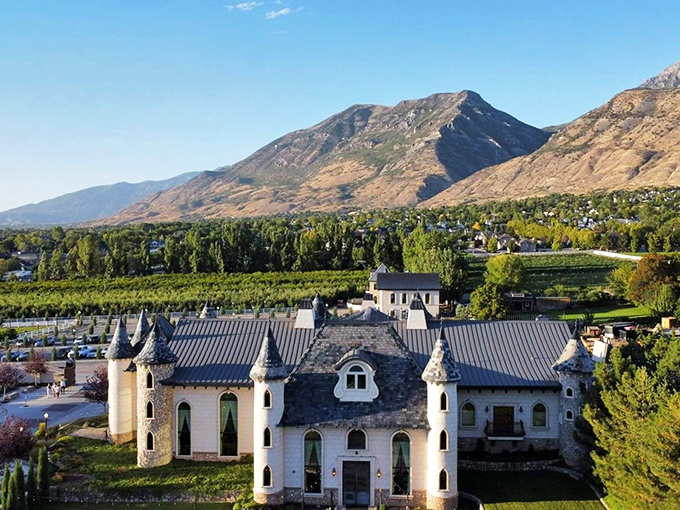 From above, the castle's true grandeur reveals itself&mdash;a European fantasy nestled among vineyards and orchards with Utah's majestic mountains standing guard.