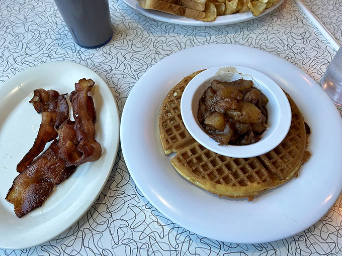 Waffles aren't breakfast&mdash;they're edible plates designed to deliver cinnamon apples and bacon to your face. The perfect sweet-savory morning symphony.