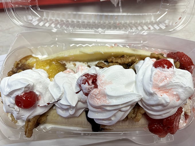 The banana split—the Everest of ice cream indulgence. This mountain of whipped cream, cherries, and multiple flavors demands to be shared, but you won't want to.