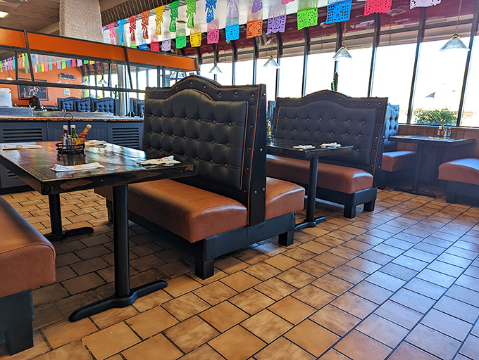 High-backed booths create little islands of privacy in a sea of festivity. These aren't just seats&mdash;they're front-row tickets to your own personal fiesta.