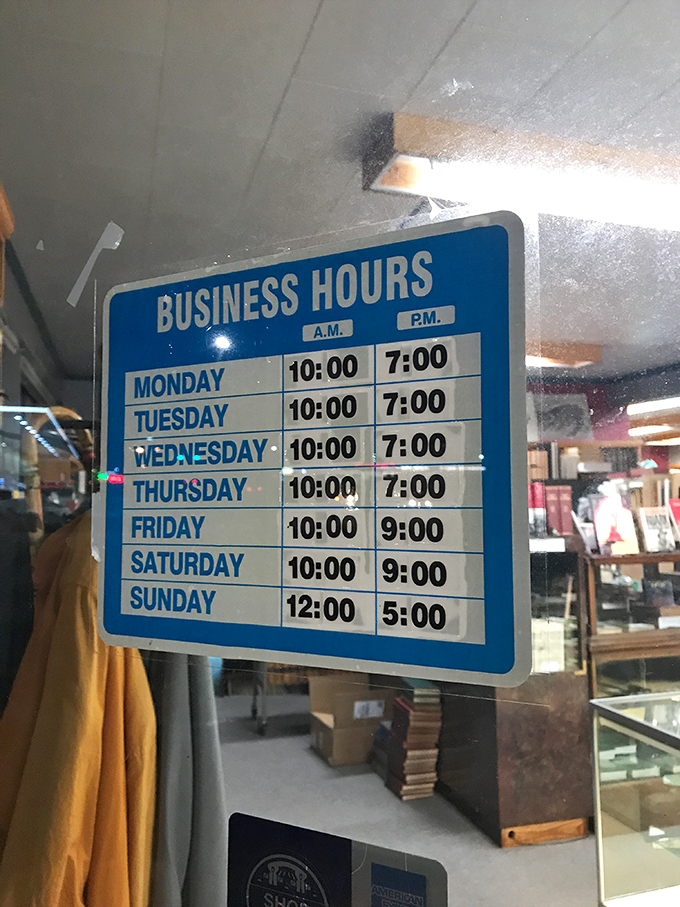 The hours posted reveal a generous schedule for literary exploration. Time expands when surrounded by half a million possibilities.