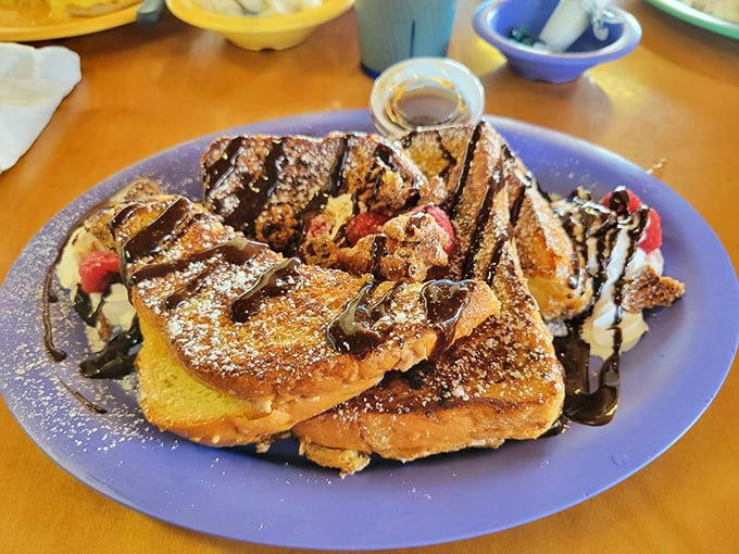 Cannoli Stuffed French Toast that makes dessert jealous. This sweet morning masterpiece, drizzled with chocolate, makes you question why we ever separated breakfast from dessert.