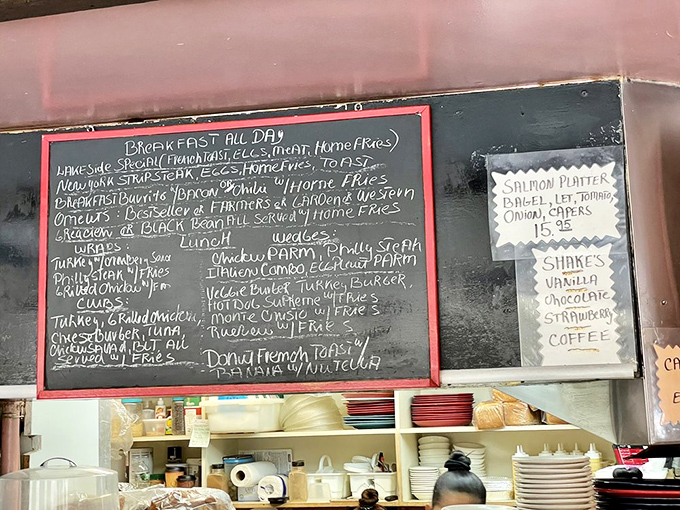 The chalkboard menu - where daily specials transform into daily necessities. Those handwritten items aren't options; they're gentle commands from the kitchen.