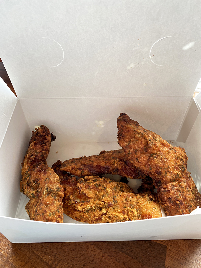 Golden-brown chicken tenders nestled in their takeout box&mdash;proof that sometimes the simplest pleasures are the most satisfying. 