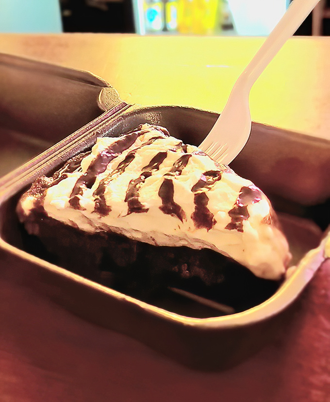 A slice of chocolate pie that's clearly not playing around. That drizzle on top isn't just for show&mdash;it's the final brushstroke on a masterpiece of sweetness.