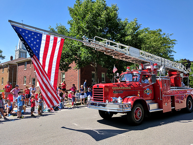 Nothing says "small-town America" like a vintage fire truck parade where the crowd size rivals the town's population. Norman Rockwell would approve.