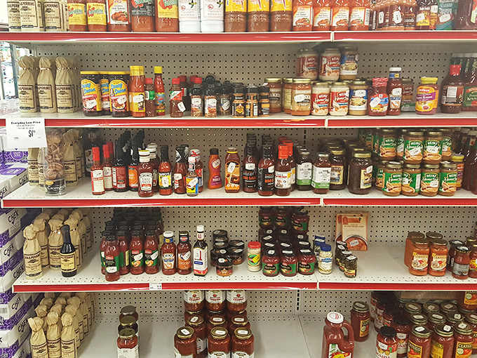 Hot sauces, maple syrups, and specialty condiments lined up like soldiers of flavor&mdash;each bottle a potential kitchen game-changer at a fraction of the cost.