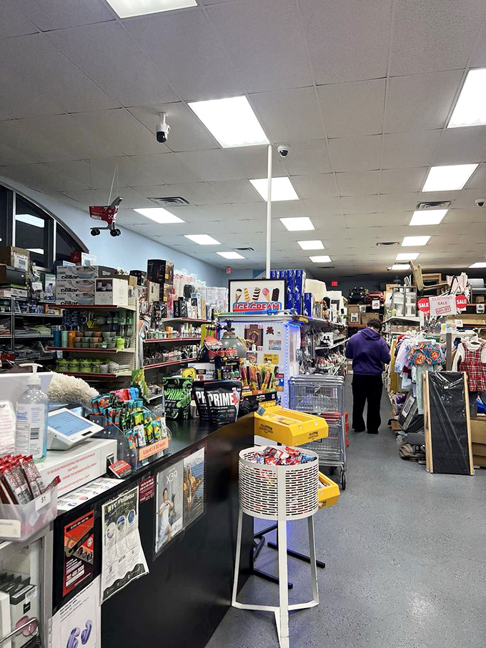 The checkout counter—final gateway between you and bargain victory. That candy display ensures you'll leave with one more deal than you planned.