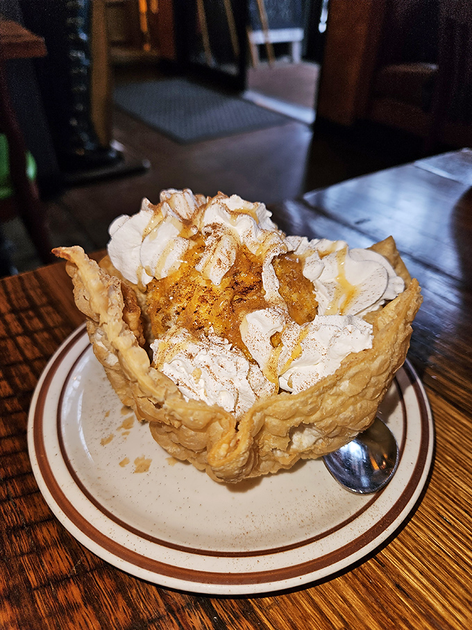 The deep-fried ice cream arrives like a crispy-shelled surprise package &ndash; hot meets cold in a dessert that defies both physics and willpower.