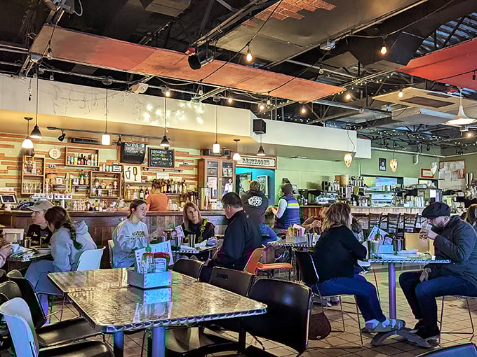 The soundtrack to Saturday morning happiness: clinking plates, murmuring conversations, and the occasional gasp of someone taking their first bite.