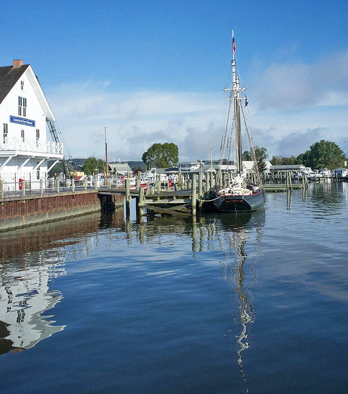 Historic homes stand sentinel along Essex's waterfront, where modern vessels share docking space with boats that could tell tales of bygone eras. 