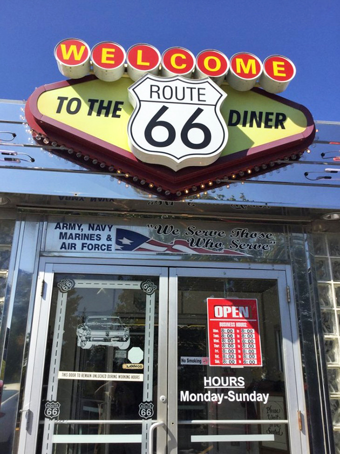 "We Serve Those Who Serve"&mdash;this entrance doesn't just welcome you to a meal, but to a slice of Route 66 legacy.