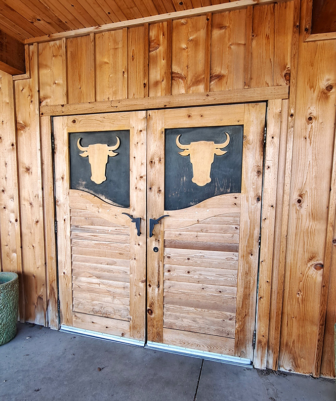 Those saloon-style doors with longhorn silhouettes aren't just an entrance&mdash;they're a portal to a world where beef is king and calories don't count.
