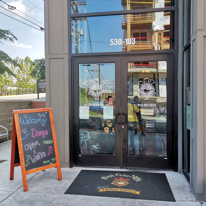A welcoming entrance with a hand-written chalkboard sign – the culinary equivalent of a friend waving you over to the good table.