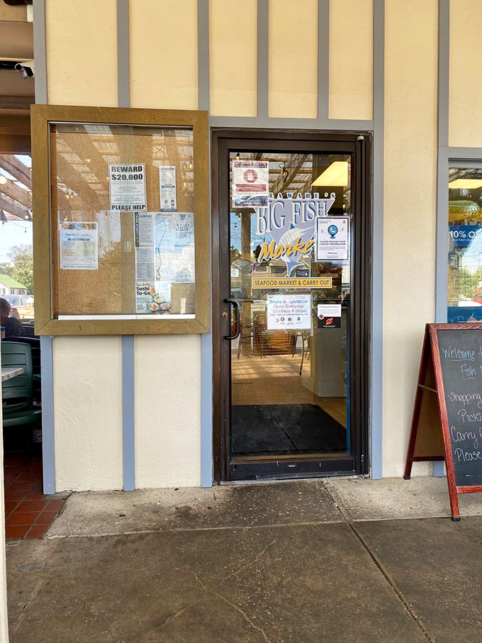 The unassuming entrance to Big Fish Market &ndash; where take-home treasures await those who want to extend the seafood celebration.