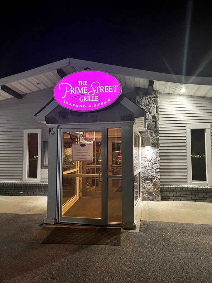 As night falls, that iconic pink glow becomes even more inviting&mdash;like a lighthouse guiding hungry travelers to safe, delicious harbor.