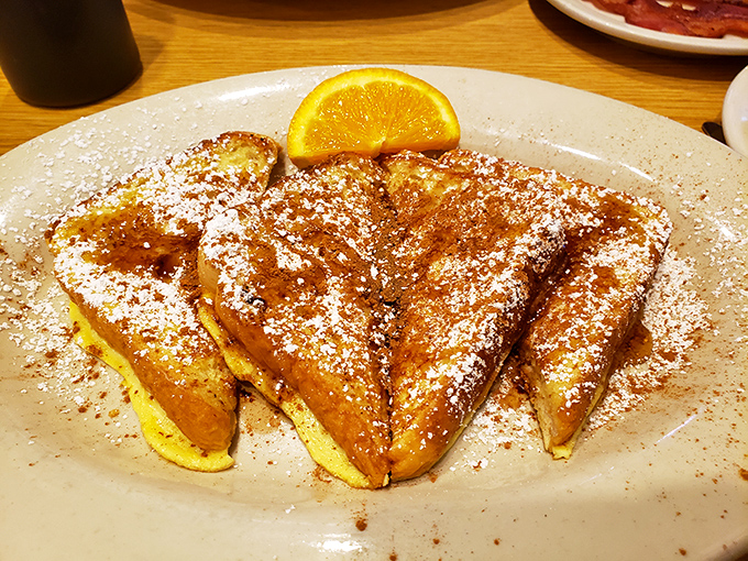French toast that's achieved the perfect golden-brown exterior while maintaining that custard-like interior – the breakfast equivalent of winning the lottery.