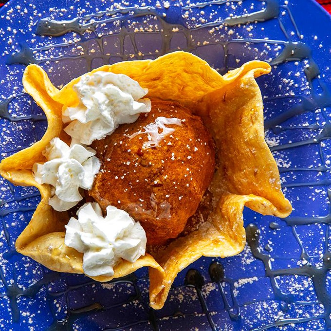 Fried ice cream: where hot meets cold and somehow nobody gets hurt. The contradiction that proves dessert can indeed be an adventure.