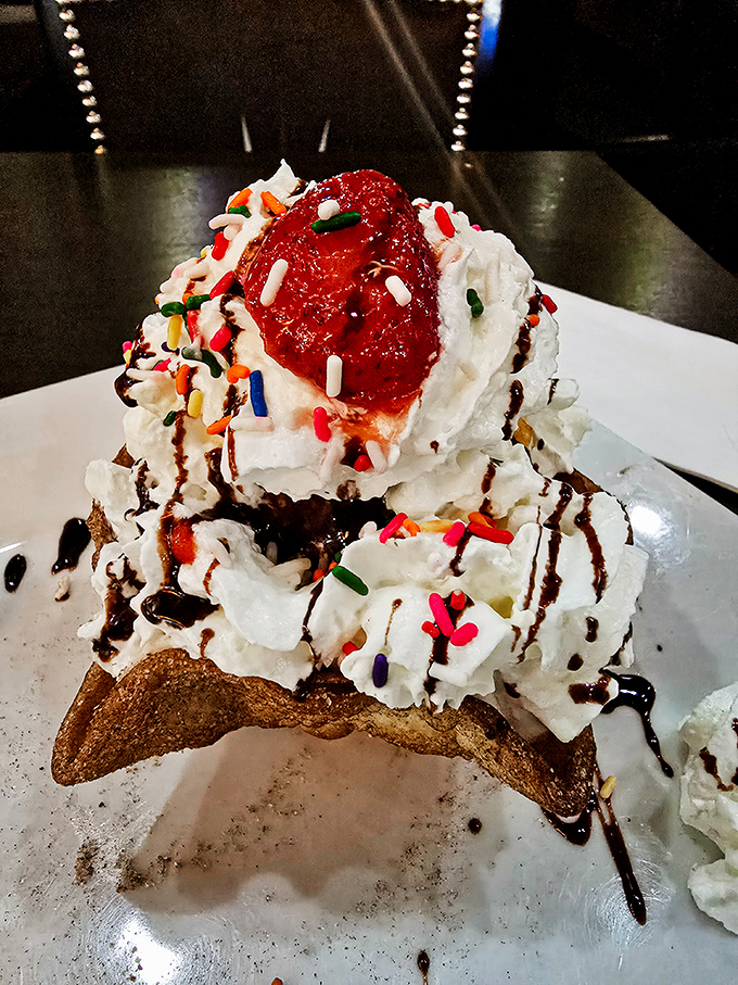 Fried ice cream wearing a party hat of whipped cream and sprinkles. This dessert doesn't just end the meal&mdash;it hosts a farewell celebration.