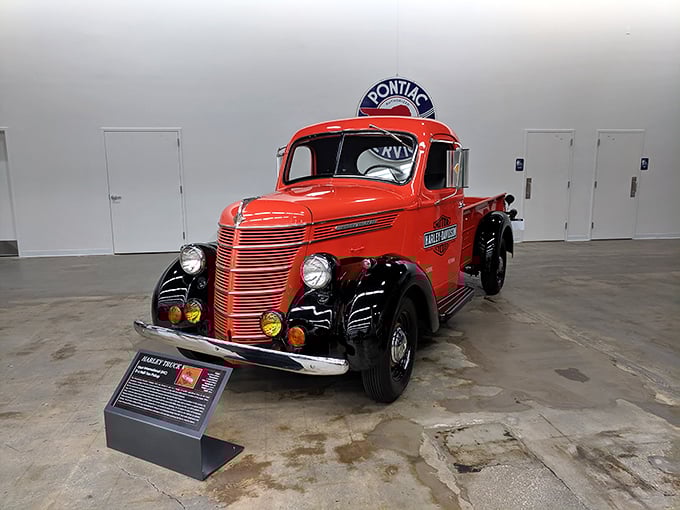 This fire-engine red vintage Pontiac truck stands as a testament to when working vehicles were built with both muscle and personality.
