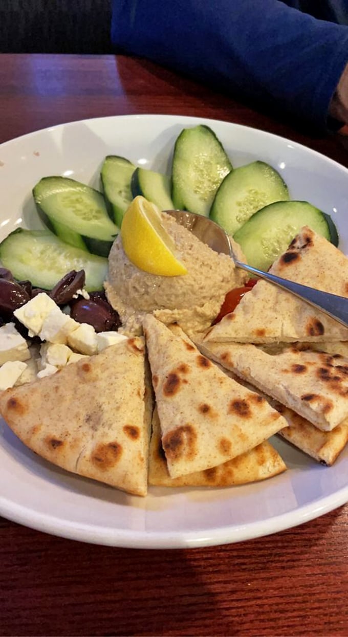 Mediterranean meets Midwest in this hummus plate. Those warm triangles of pita are just vehicles for maximum dipping efficiency.