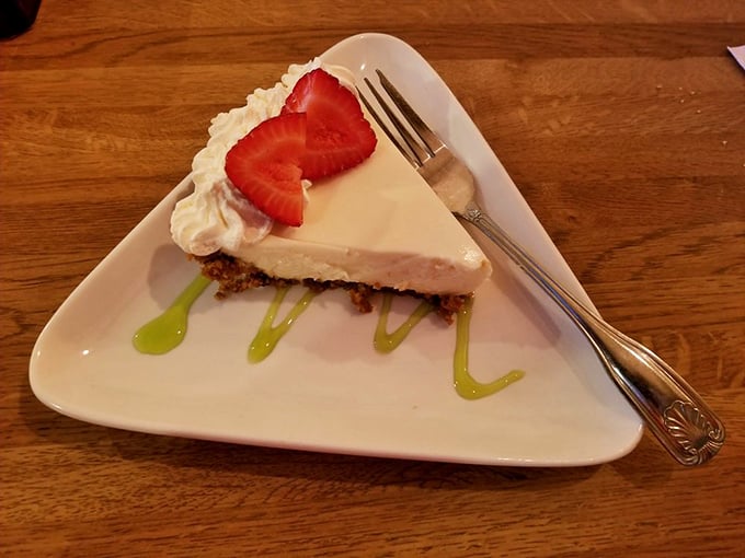 The exterior view shows Dodge City standing proud along the roadside, like a beacon for the beef-obsessed. That porch practically beckons hungry travelers. 