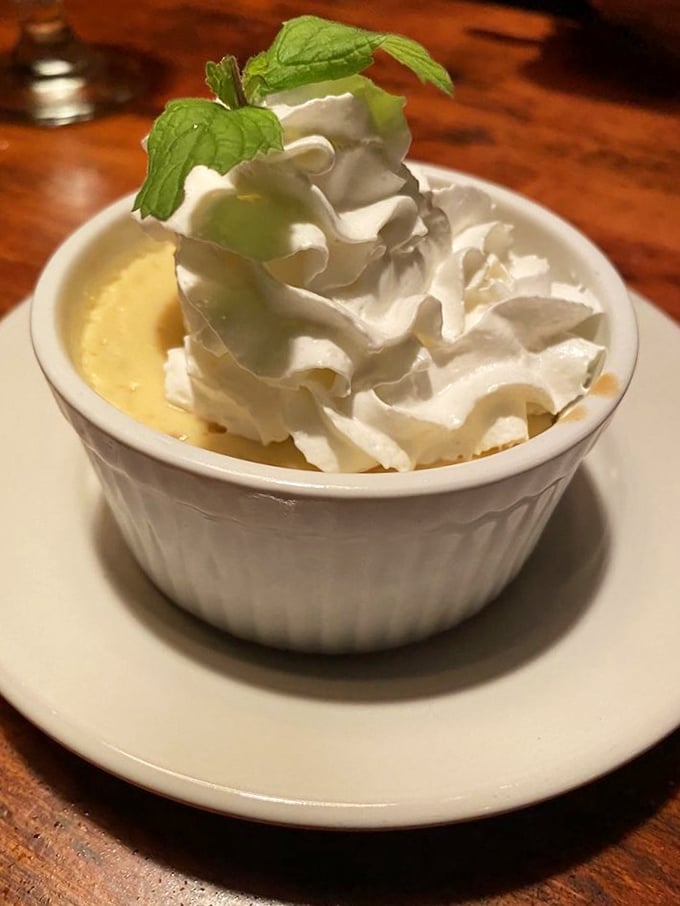 This isn't just Key Lime Pie&mdash;it's sunshine in a ramekin topped with clouds of whipped cream and a mint leaf that's not just garnish, but permission to indulge.