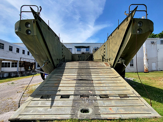 This massive military landing craft sits outside the museum like a beached mechanical whale. When your car collection includes vehicles that could invade Normandy.