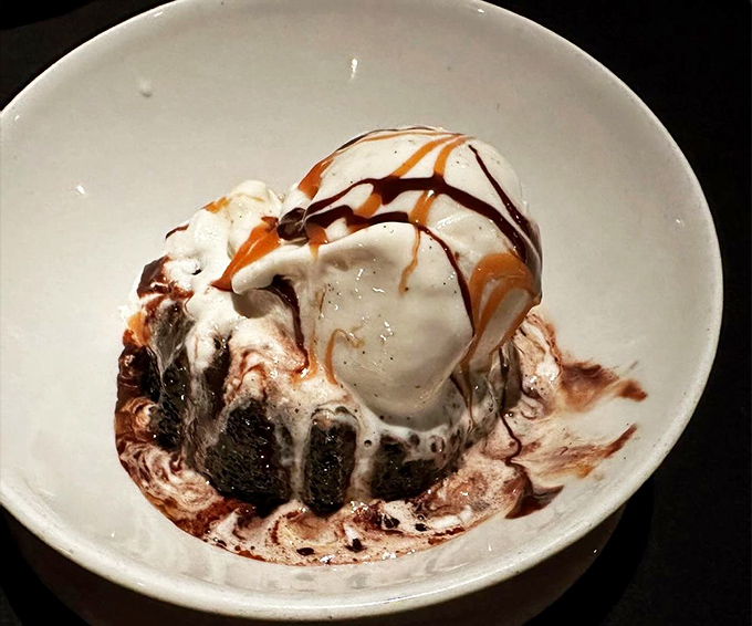 A warm chocolate lava cake that erupts with molten goodness&mdash;proof that volcanoes can be delicious when properly contained in dessert form.