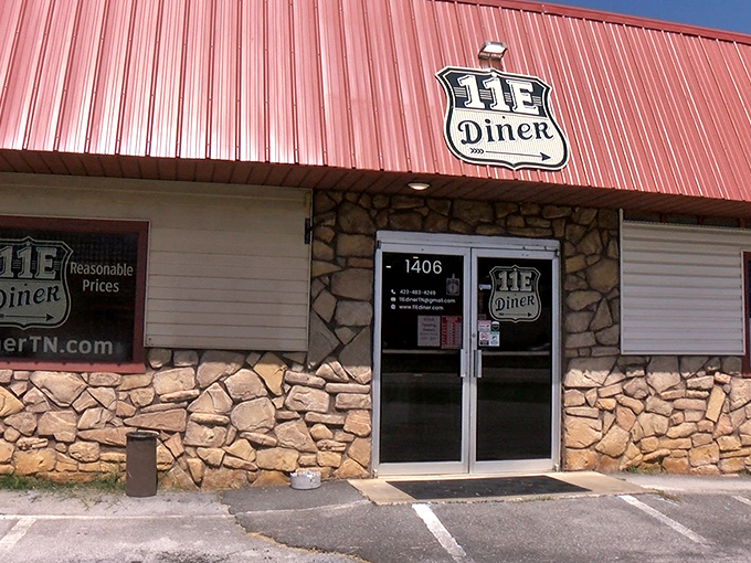 The Diner's unassuming exterior hides what locals know: some of the best comfort food in Tennessee waits behind that stone-framed door.