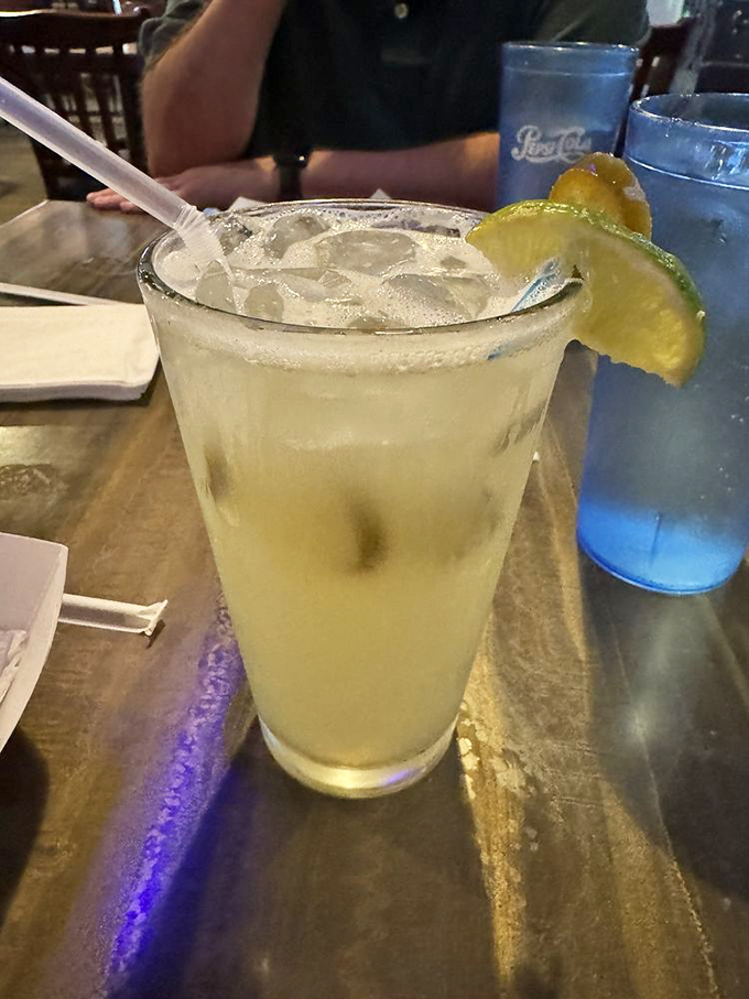 A perfectly balanced margarita with a lime garnish&mdash;because great seafood deserves equally thoughtful libations to wash it down.