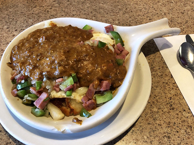 The exterior may be humble, but inside lies a temple of Michigan comfort food. Where parking spots are coveted like front-row tickets to a Springsteen concert. 