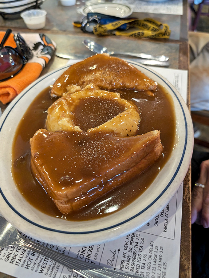 The open-faced hot turkey sandwich swimming in gravy is comfort food defined &ndash; no fancy plating required when it tastes this good.